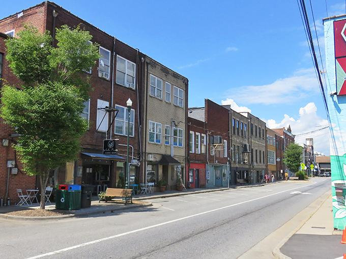 Main Street Sylva offers that perfect small-town vibe where brick buildings tell stories and sidewalk benches invite you to slow down and stay awhile.