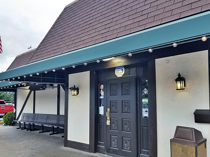 The unassuming exterior hides culinary treasures within, like finding a Ferrari parked behind a garden shed. Those twinkling lights promise Italian magic awaits.