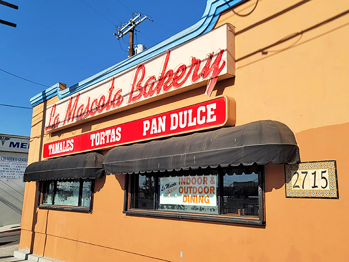 The iconic storefront of La Mascota Bakery stands proudly in Boyle Heights, its vintage sign promising three pillars of Mexican comfort: tamales, tortas, and the star attraction&mdash;pan dulce.