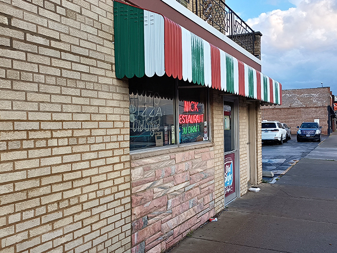 The Italian flag-inspired awning isn't just decoration&mdash;it's a beacon of pizza promise on Chicago's South Side since 1932.