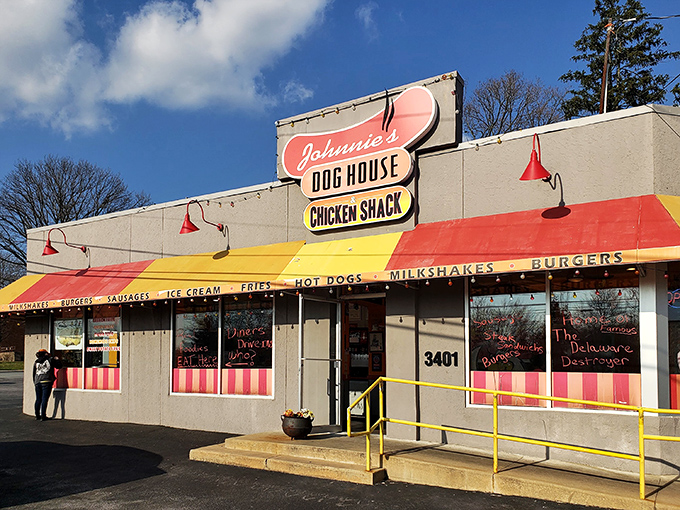 The retro charm of Johnnie's Dog House and Chicken Shack beckons from Concord Pike like a delicious time machine promising comfort food nirvana.