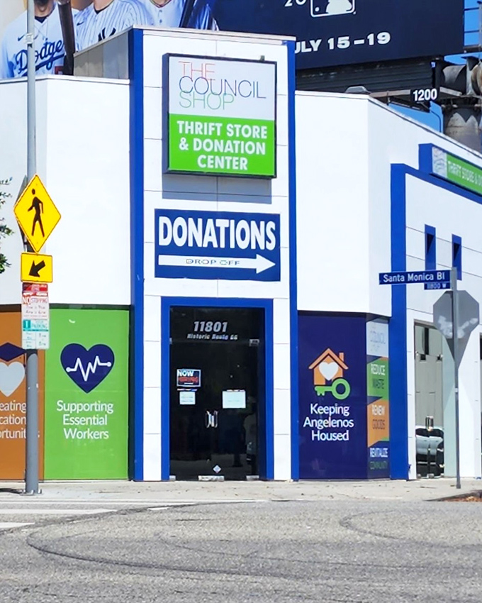 The teal and white exterior of The Council Shop stands out on Santa Monica Boulevard like a beacon for bargain hunters with a conscience.
