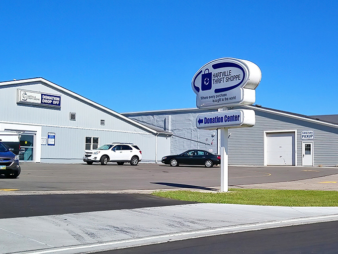 The colonial-style facade of Hartville Thrift Shoppe stands like a temple to second chances, where bargain hunters make their pilgrimage for retail redemption.