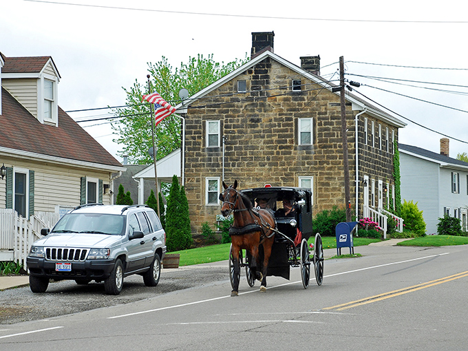 Historic brick buildings line the street like old friends gathering for their daily conversation.