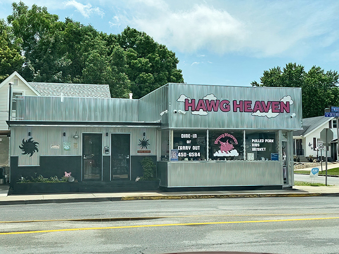 Shining like a silver beacon of barbecue bliss, Hawg Heaven’s corrugated exterior promises no frills—just smoky treasures and thrills for your taste buds.