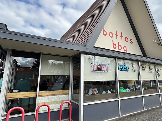The iconic A-frame of Botto's BBQ stands like a beacon of smoky promise against the Portland sky. Simple, unpretentious, and absolutely magnetic to meat lovers.