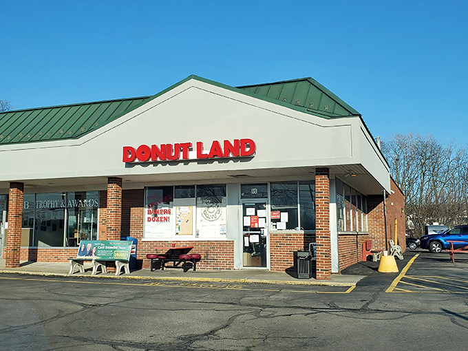 The red brick facade and cheerful signage promise sweet treasures within this Brunswick neighborhood gem.