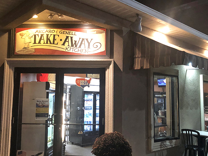 The unassuming facade of Arcaro and Genell's Take-Away Kitchen proves once again that culinary treasures often hide behind the most modest doors.