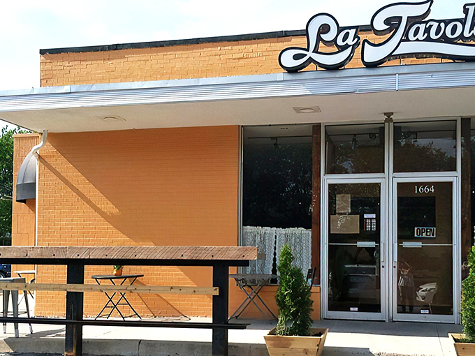 The unassuming exterior of La Tavola belies the culinary treasures within. Like finding a Lamborghini parked behind a garden shed.