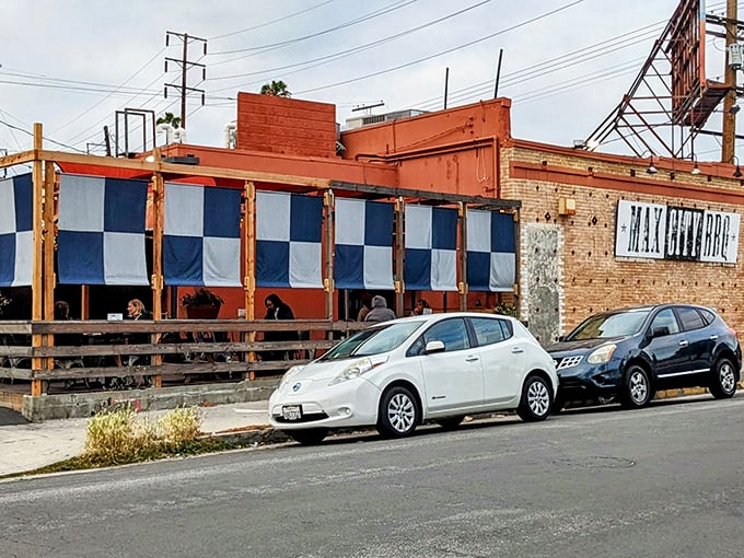 The blue and white checkered awnings of Max City BBQ beckon like a smoke signal to hungry Angelenos seeking authentic barbecue bliss.