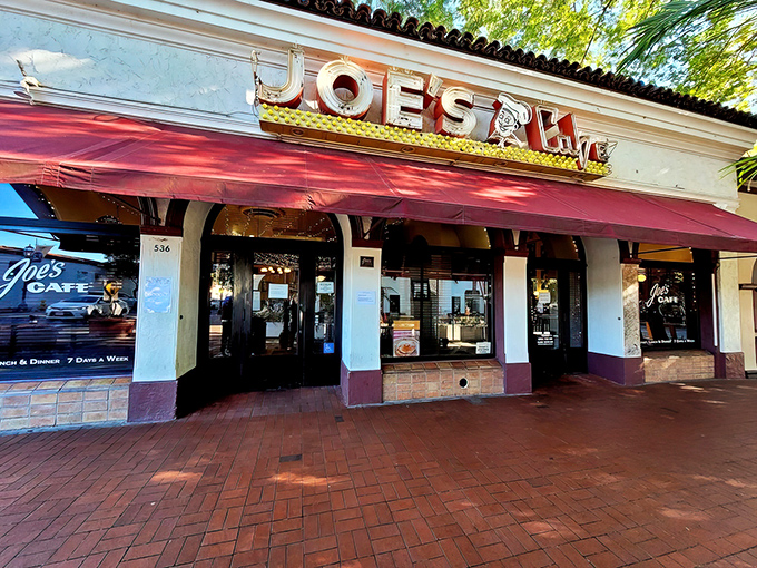 The iconic red awning and vintage neon sign of Joe's Caf&eacute; stand as a time capsule on Santa Barbara's State Street, beckoning hungry patrons since long before Instagram made food famous.