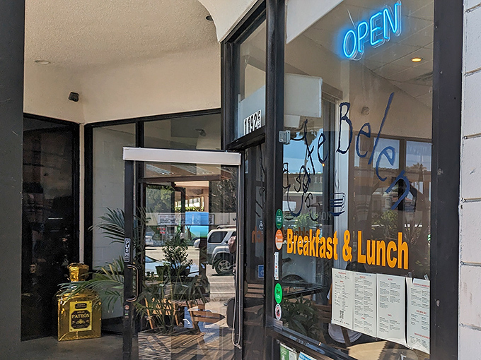 The blue neon "OPEN" sign beckons like a lighthouse for the breakfast-starved. Simple storefront, extraordinary flavors waiting inside.