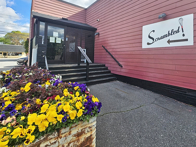 The pink exterior of Scrambled isn't just a building—it's a morning beacon of hope for the breakfast-deprived souls of Greensboro.