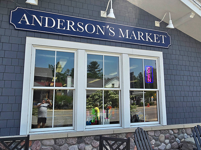 The blue-shingled facade of Anderson's Market stands like a culinary lighthouse, beckoning hungry travelers with promises of delicious discoveries within.