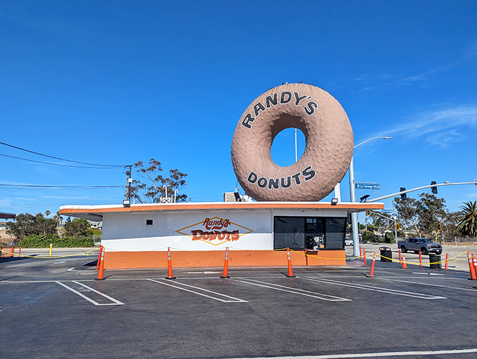 The iconic 32-foot donut beckons from the Inglewood skyline like a sugary lighthouse guiding hungry travelers home. A true California landmark!