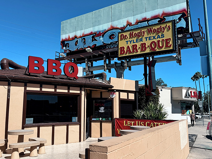 That sign alone is worth the drive to Panorama City—a beacon of smoked meat salvation amid the urban sprawl of the San Fernando Valley.