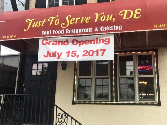 The unassuming red awning of Just To Serve You, DE beckons like a secret handshake among food lovers. Delaware's soul food sanctuary hides in plain sight.