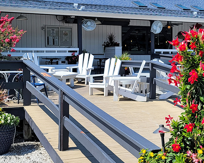 The welcoming entrance to Bluecoast beckons with coastal charm, where Delaware license plates mingle with out-of-state visitors seeking seafood nirvana.