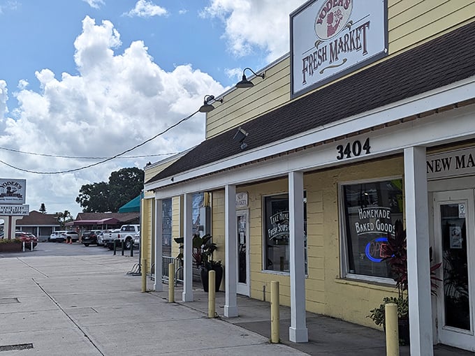 The welcoming front porch of Yoder's Restaurant beckons with rocking chairs and simple charm, proving paradise sometimes comes with an "OPEN" sign and zero pretension.