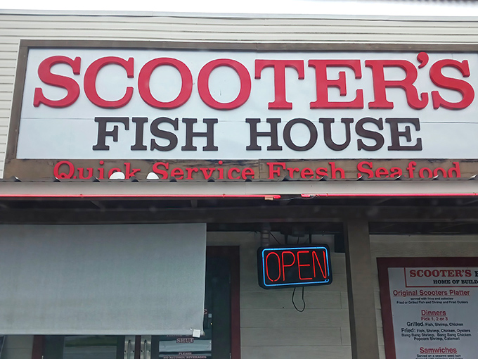 The bold red letters of Scooter's Fish House promise exactly what Florida seafood lovers crave: "Quick Service Fresh Seafood." No fancy frills, just the real deal.
