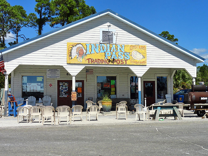 The unassuming white clapboard exterior of Indian Pass Raw Bar stands as a beacon for seafood lovers, promising authenticity over pretension.