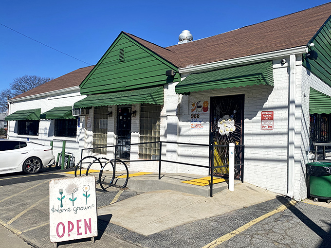 The unassuming green exterior with its pink pig logo is Atlanta's version of a culinary speakeasy—you need to know it's there.