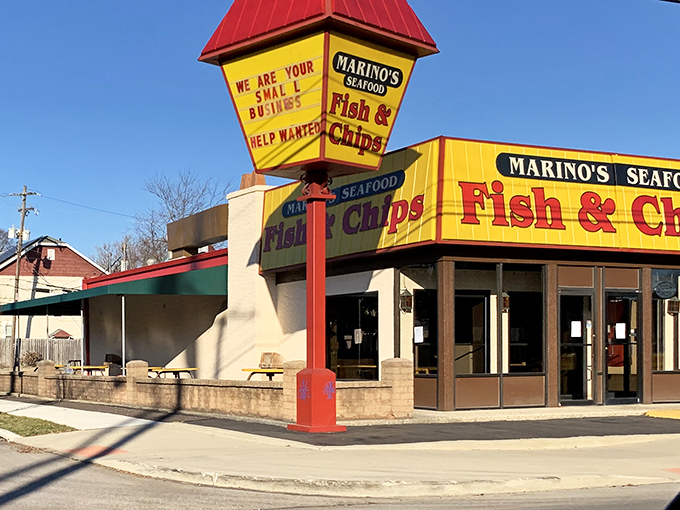 The bright yellow building with its iconic red roof stands like a beacon of fried seafood goodness in Columbus. No pretense, just promise.
