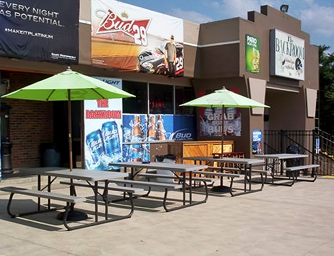 The exterior promises good times with those cheerful umbrellas &ndash; like a backyard BBQ that got its own building.