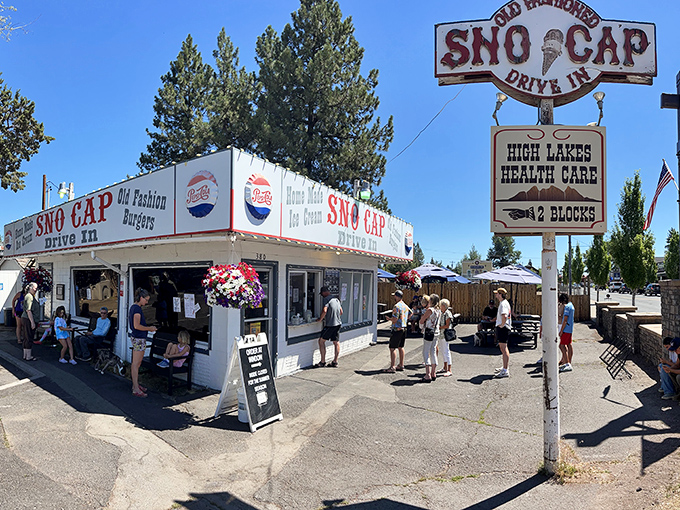 The unassuming white building with its classic red signage promises two of life's greatest pleasures: homemade ice cream and old-fashion burgers.