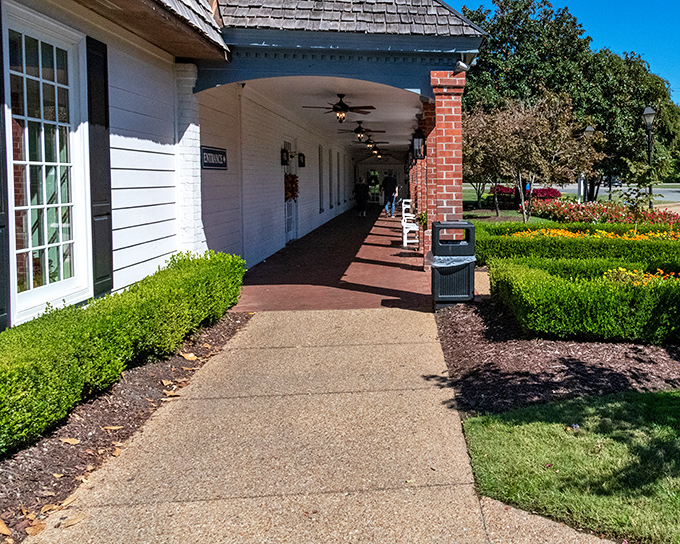Colonial charm meets seafood paradise. Captain George's exterior welcomes you with vibrant hydrangeas and classic architecture that whispers, "Come hungry, leave happy."