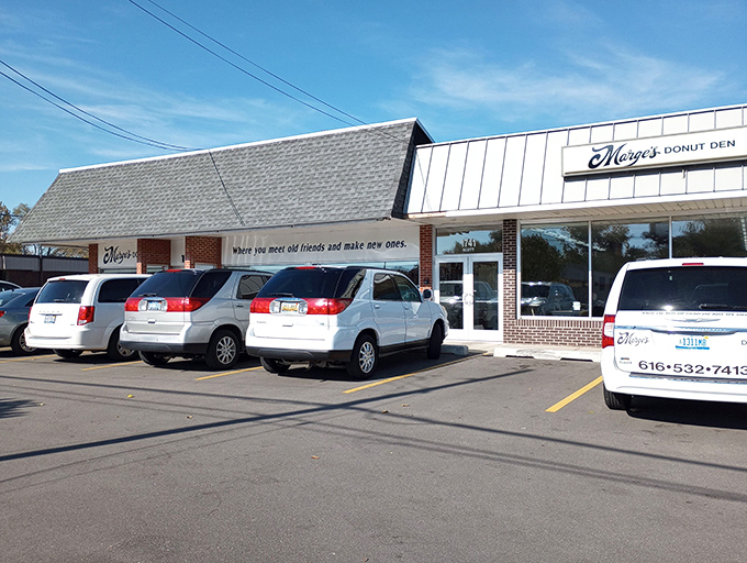 The unassuming brick exterior of Marge's Donut Den hides a wonderland of sweet treasures that locals have cherished for generations.