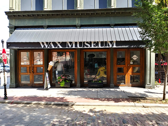 The unassuming storefront beckons with vintage charm and neon promises. Hot dogs and ice cream signs hint at the delightful oddities waiting inside.