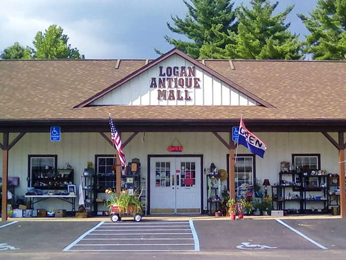 The welcoming exterior promises treasures within, where American flags flutter over displays that hint at countless stories waiting inside.