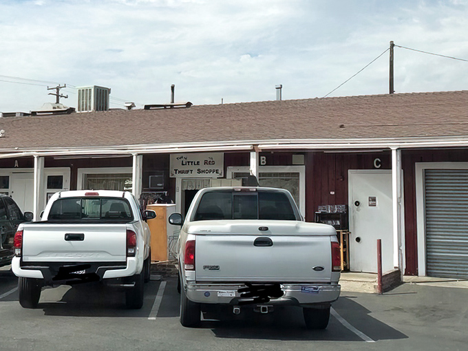 The crimson facade of Little Red Thrift Shoppe beckons like a siren call to treasure hunters. This unassuming exterior hides a labyrinth of wonders within.