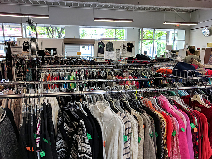 Treasure hunter's paradise! Rows upon rows of meticulously organized clothing await, each rack a potential goldmine of fashion finds.