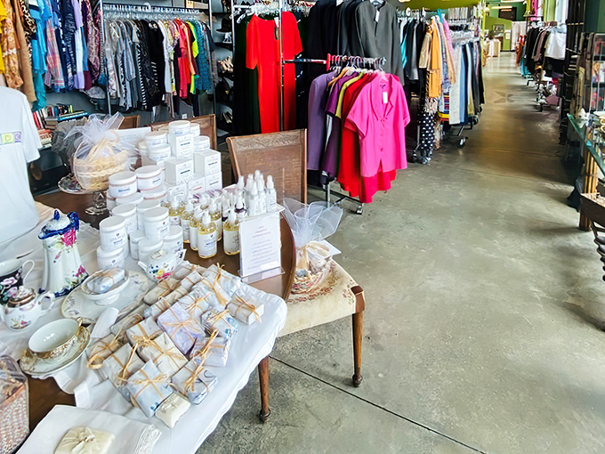 Inside Dragonfly Thrift Boutique, neatly arranged racks and displays of clothing, gifts, and home goods create a bright, inviting space that feels more like a chic boutique than a thrift store.