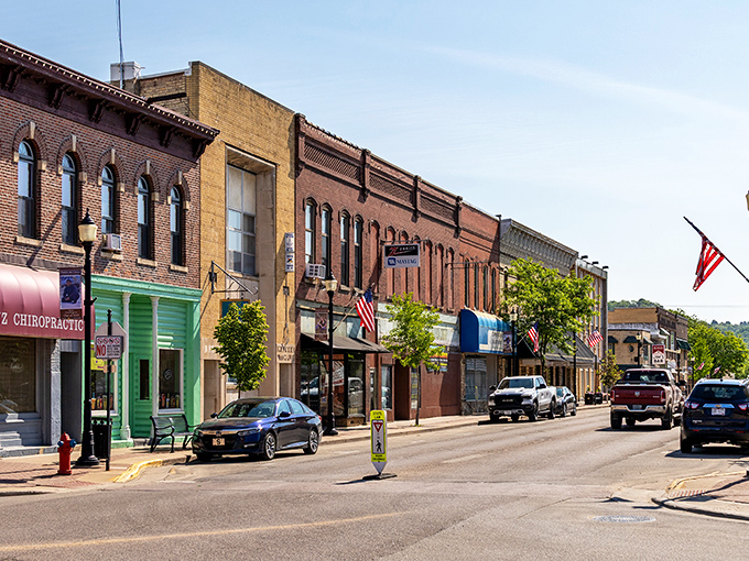 Historic charm meets small-town affordability on Prairie du Chien's main street, where brick facades have witnessed centuries of Mississippi River history.