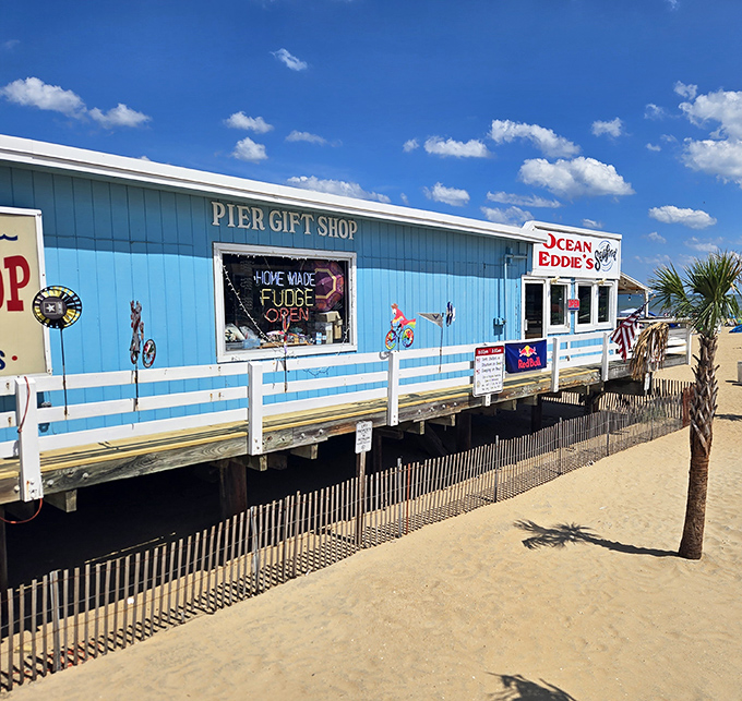 Perched on the pier like a weathered captain's quarters, Ocean Eddies waits patiently for hungry souls.