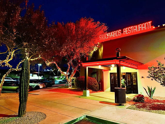 The iconic white exterior with its distinctive cow silhouette announces you've arrived somewhere special. Arizona's cattle heritage in architectural form.