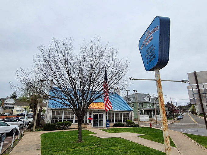 The blue-roofed beacon of breakfast hope stands proudly on Bloomsburg's street corner, promising comfort food salvation to hungry travelers and locals alike.