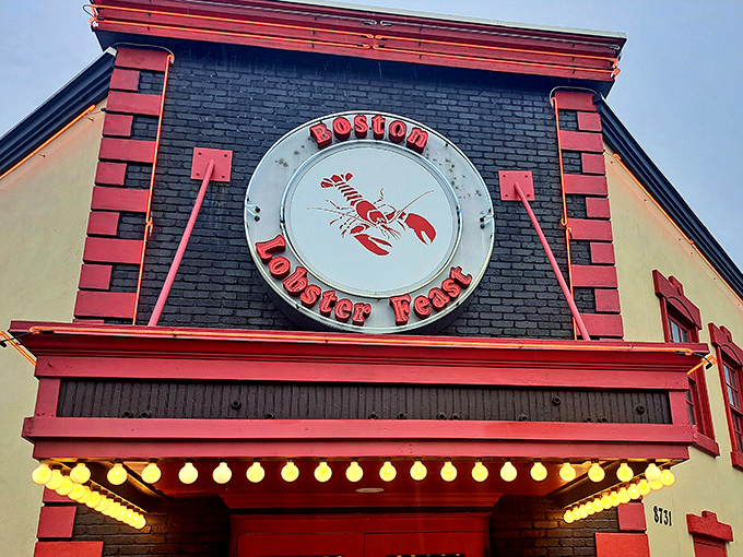 The iconic fa&ccedil;ade of Boston Lobster Feast stands like a lighthouse for seafood lovers, beckoning hungry travelers with its unmistakable lobster sign.