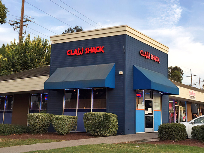 The navy-blue exterior of Claw Shack stands like a beacon of seafood salvation in San Jose. Those red letters promise delicious adventures await inside.