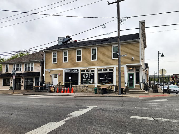 The unassuming yellow exterior of Wooden Paddle in Lemont hides a culinary wonderland within. Pizza paradise doesn't always wear a fancy dress.