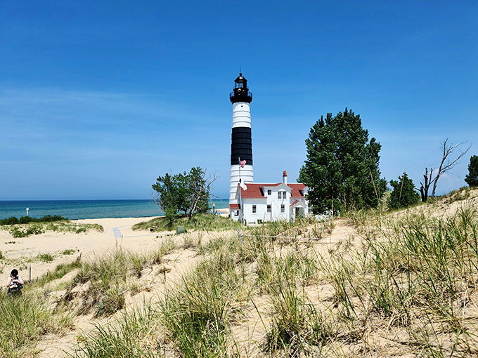 Standing tall against Michigan's endless blue sky, Big Sable's iconic black and white stripes make it the supermodel of Great Lakes lighthouses.
