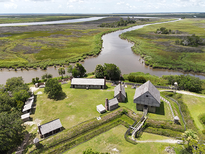 The wooden fortress stands like a time capsule against the Georgia sky, its weathered planks whispering stories of colonial ambition and frontier hardship.