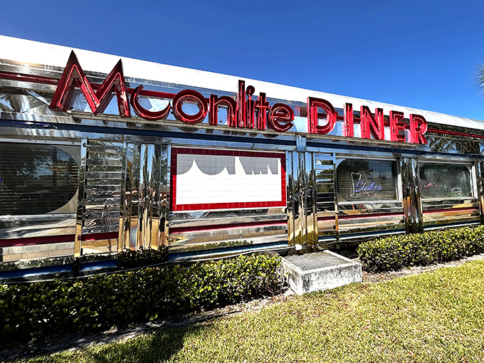 That gleaming silver exterior with bold red lettering isn't just eye-catching&mdash;it's a time portal to when Elvis was king and milkshakes were breakfast food.