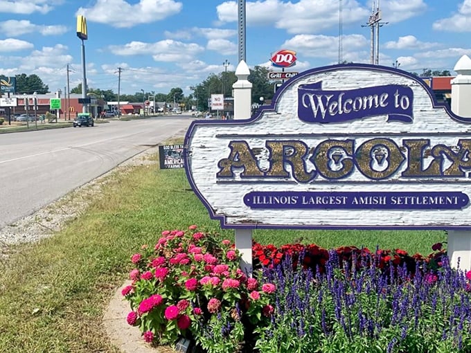 The welcome sign says it all &ndash; Arcola proudly embraces its Amish heritage while McDonald's and DQ stand nearby, a perfect metaphor for this charmingly contradictory town.