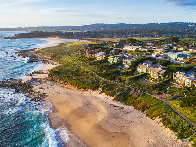 Carmel's pristine white sand beach stretches like nature's welcome mat, inviting you to kick off your shoes and stay awhile.