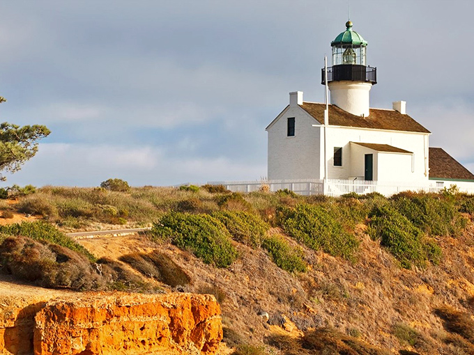 Standing proudly against the California sky, Old Point Loma Lighthouse looks like it's auditioning for a Wes Anderson film with its perfect symmetry and coastal charm.