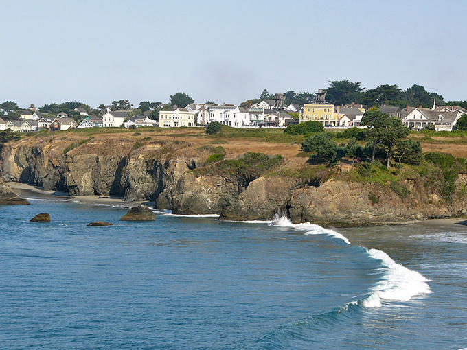 Mendocino's white Victorian homes perch dramatically on rugged cliffs, like a New England postcard that somehow drifted to the California coast.